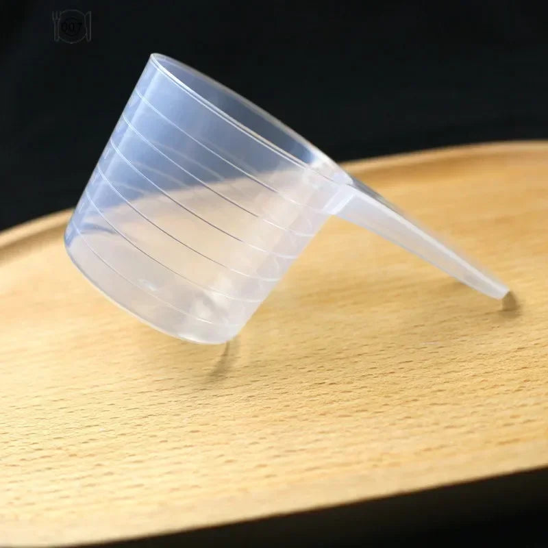 Transparent Measuring Cup With Long Handle on Luulla